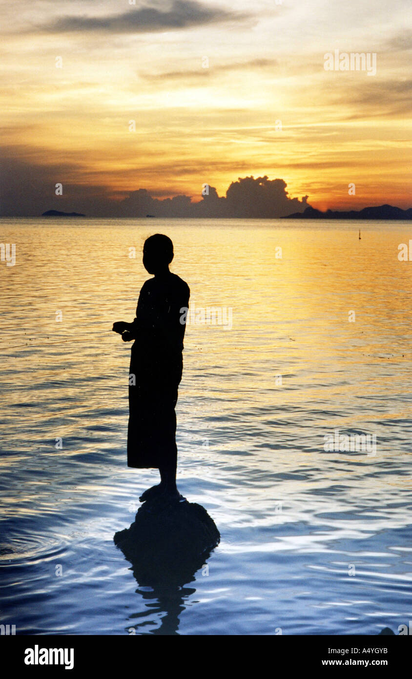 Woman in sunset hi-res stock photography and images - Alamy