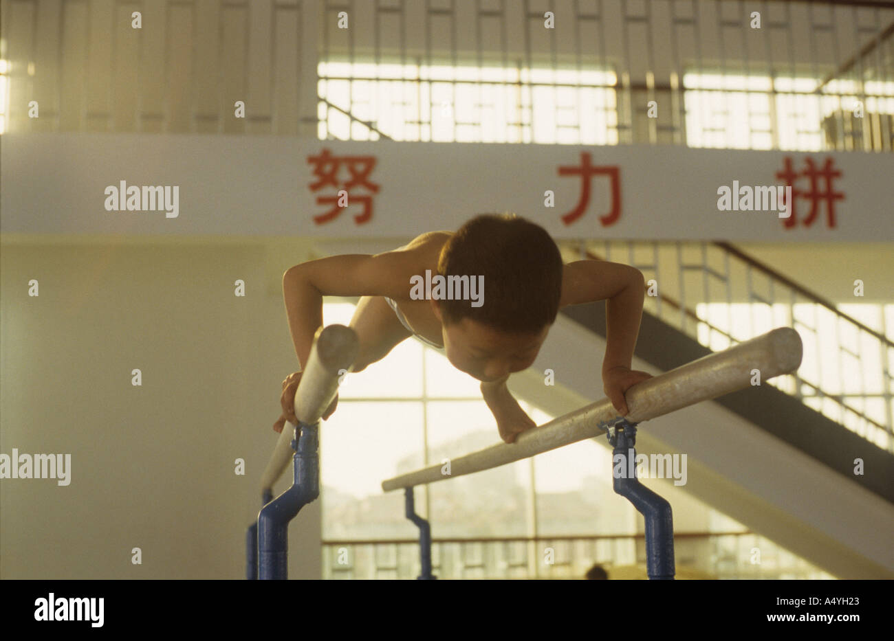 Children practice gymnastics in Xiantao Hubei China Stock Photo - Alamy