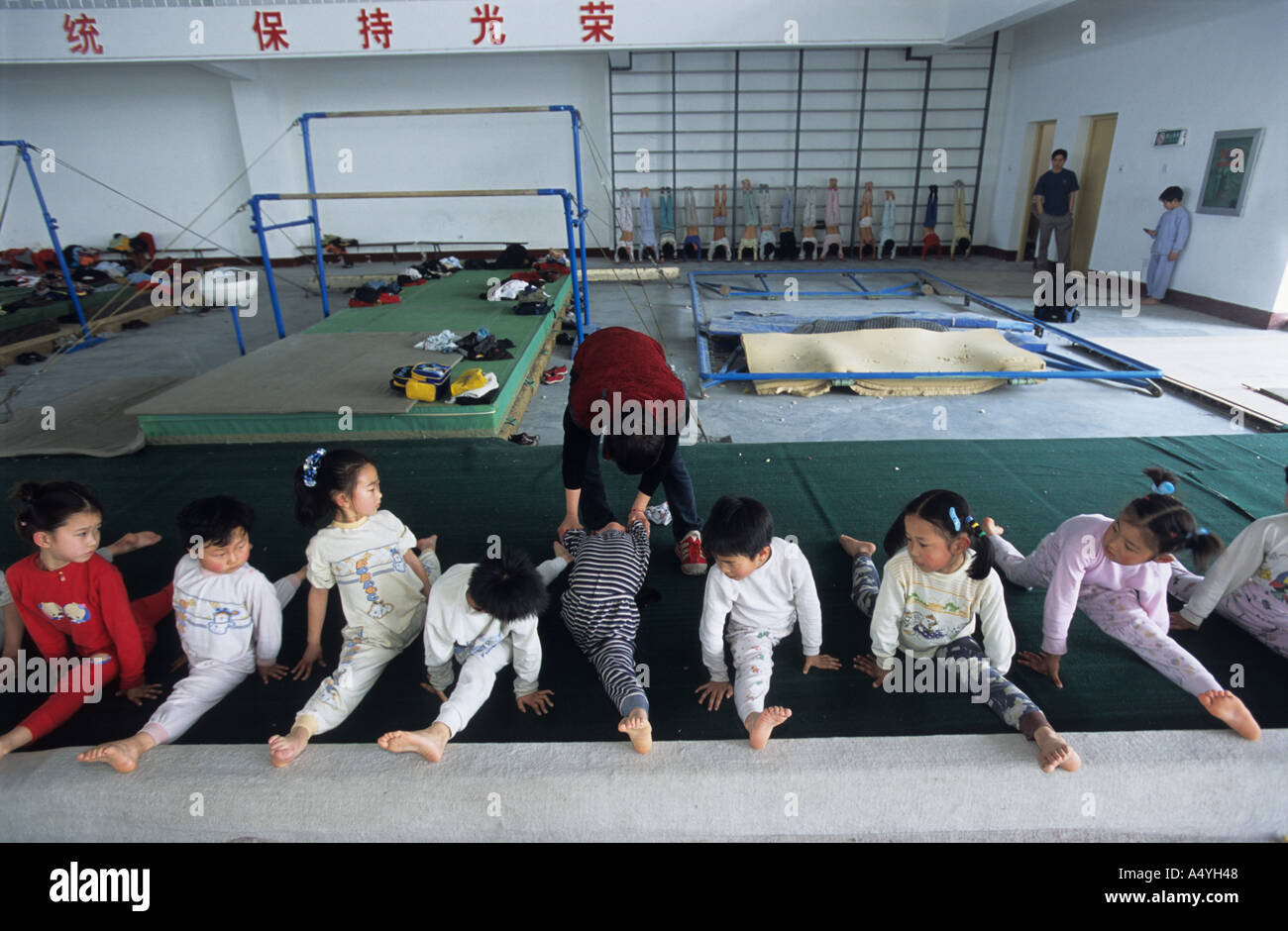 Children practice gymnastics in Xiantao Hubei China Stock Photo - Alamy