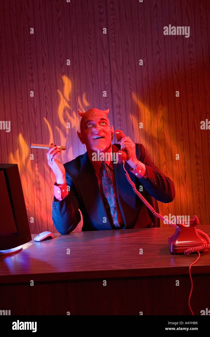 Devil on the phone hi-res stock photography and images - Alamy