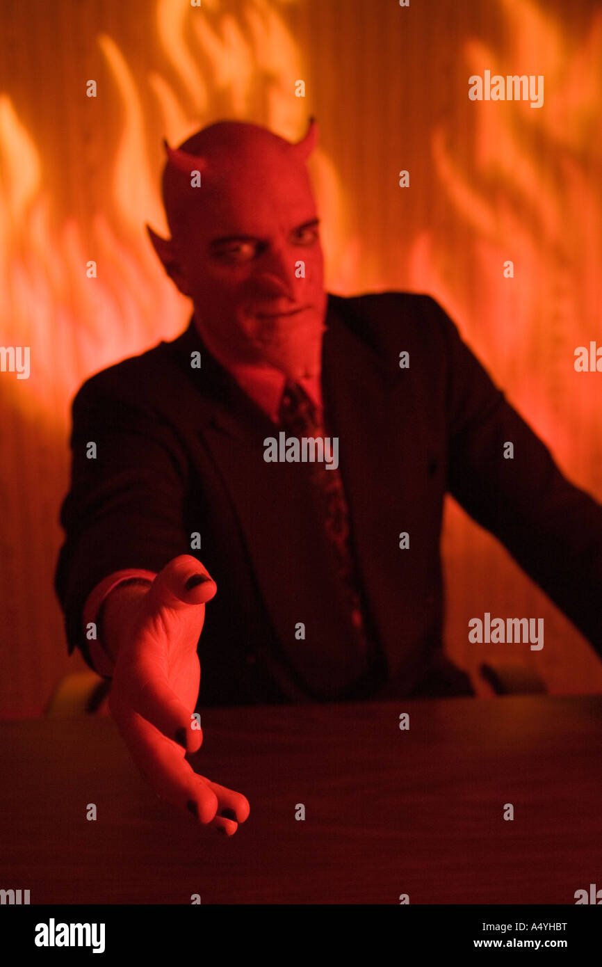 Shake hands with the devil hi-res stock photography and images - Alamy