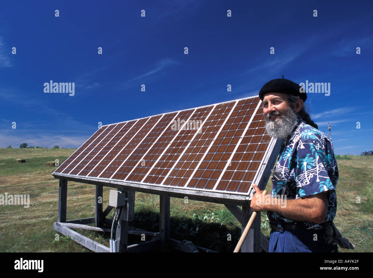 Organic Farmer with the solar panels he uses to supply electricity to ...