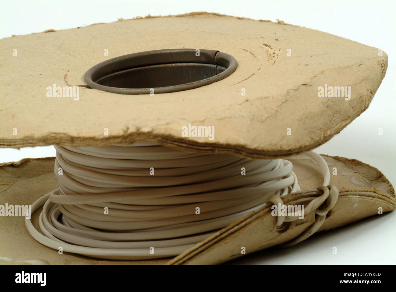 old telephone cable reel on white background Stock Photo - Alamy