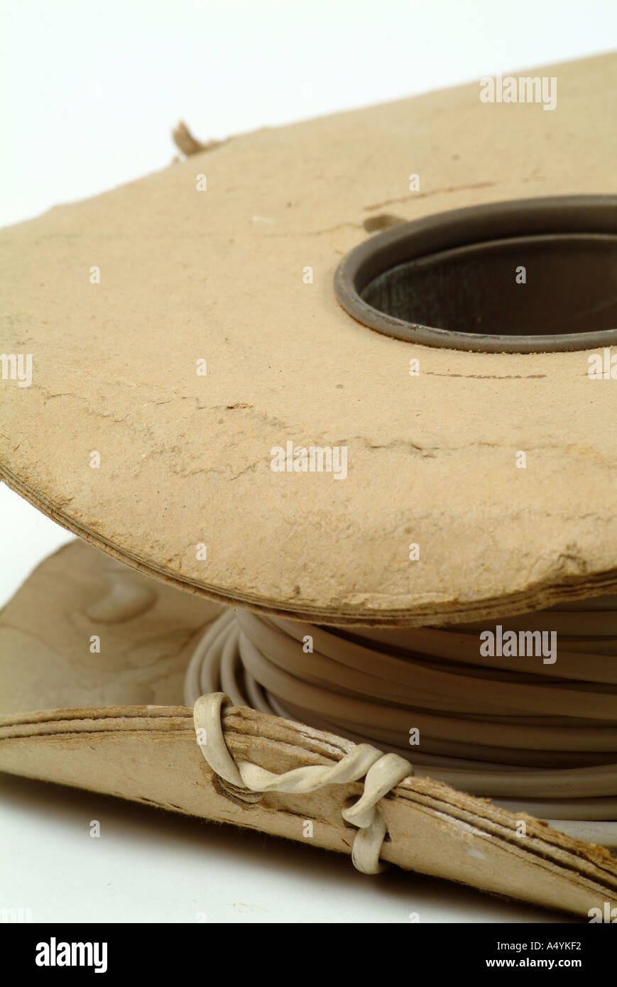 old telephone cable reel on white background Stock Photo - Alamy