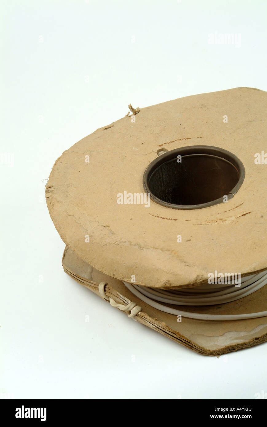 old telephone cable reel on white background Stock Photo - Alamy