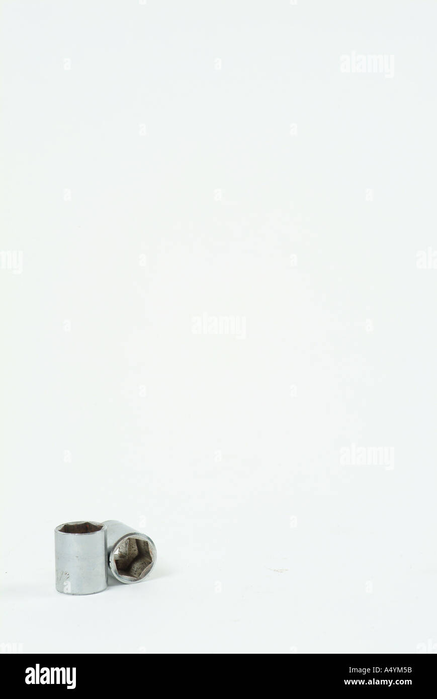two shiny metal sockets on a white background Stock Photo - Alamy