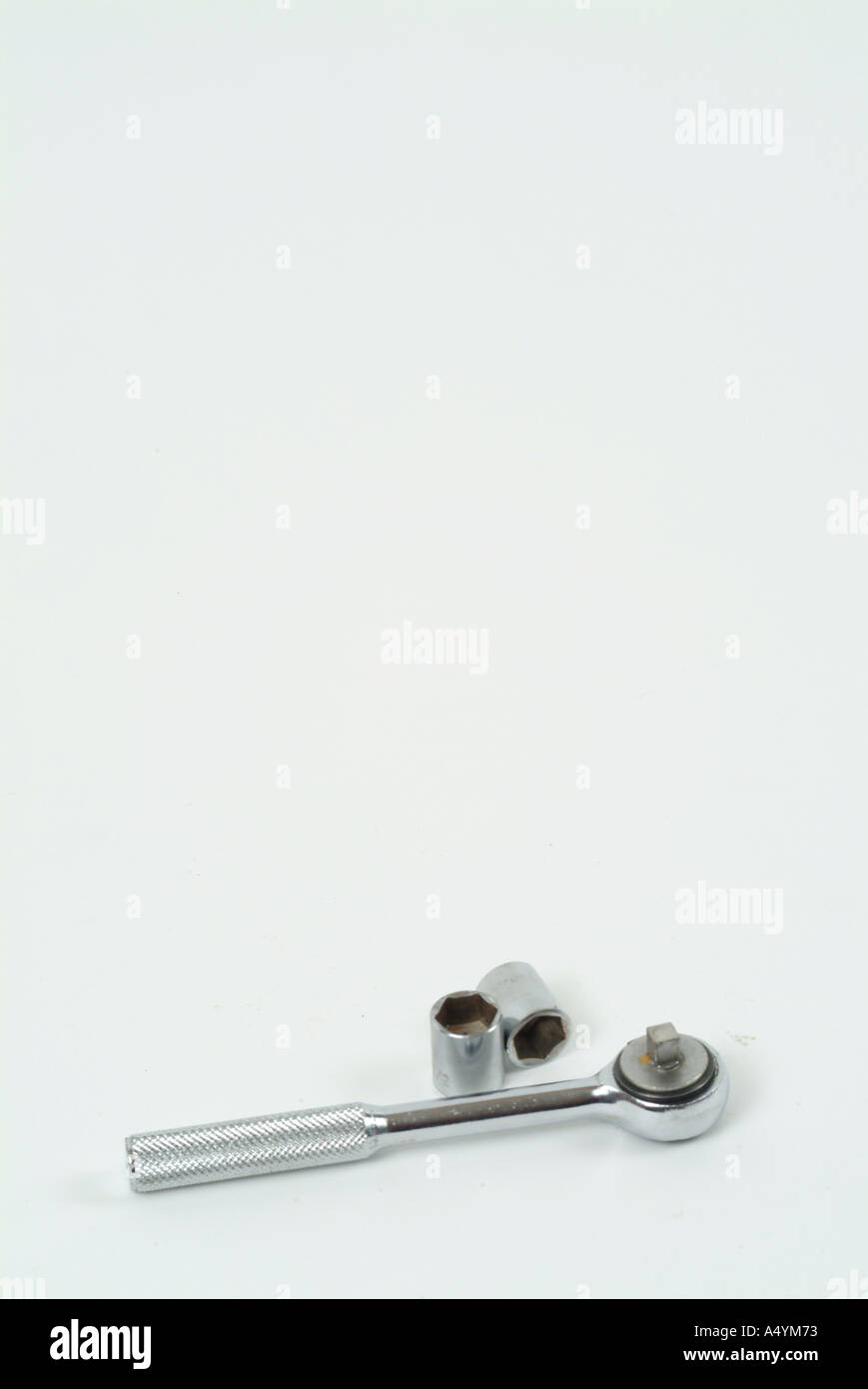 shiny metal socket and handle on a white background Stock Photo - Alamy