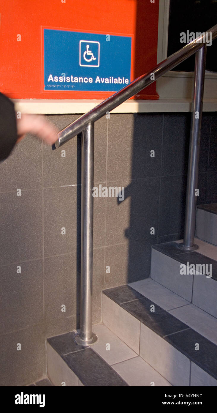 ASSISTANCE AVAILABLE Sign outside high street store indicating that ...