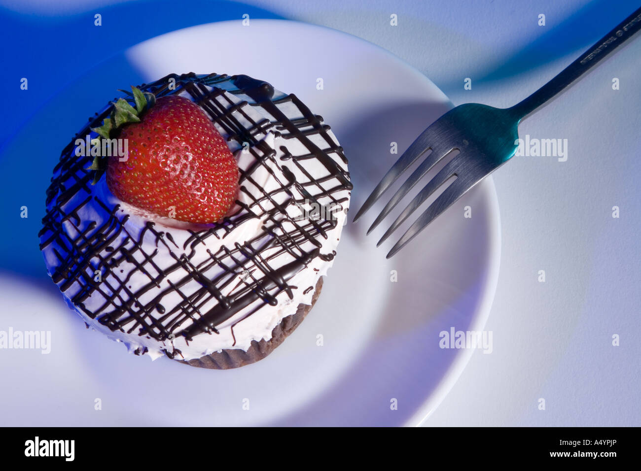 Cupcake on a plate Stock Photo - Alamy