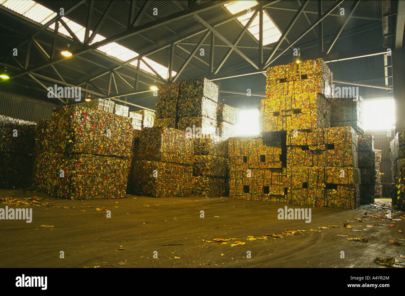 Stacks of baled crushed cans in warehouse at the beginning of the ...