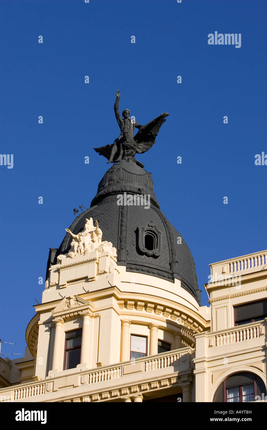 Black statue and dome on roof of bank, Plaza Arenal, Bilbao, Basque ...