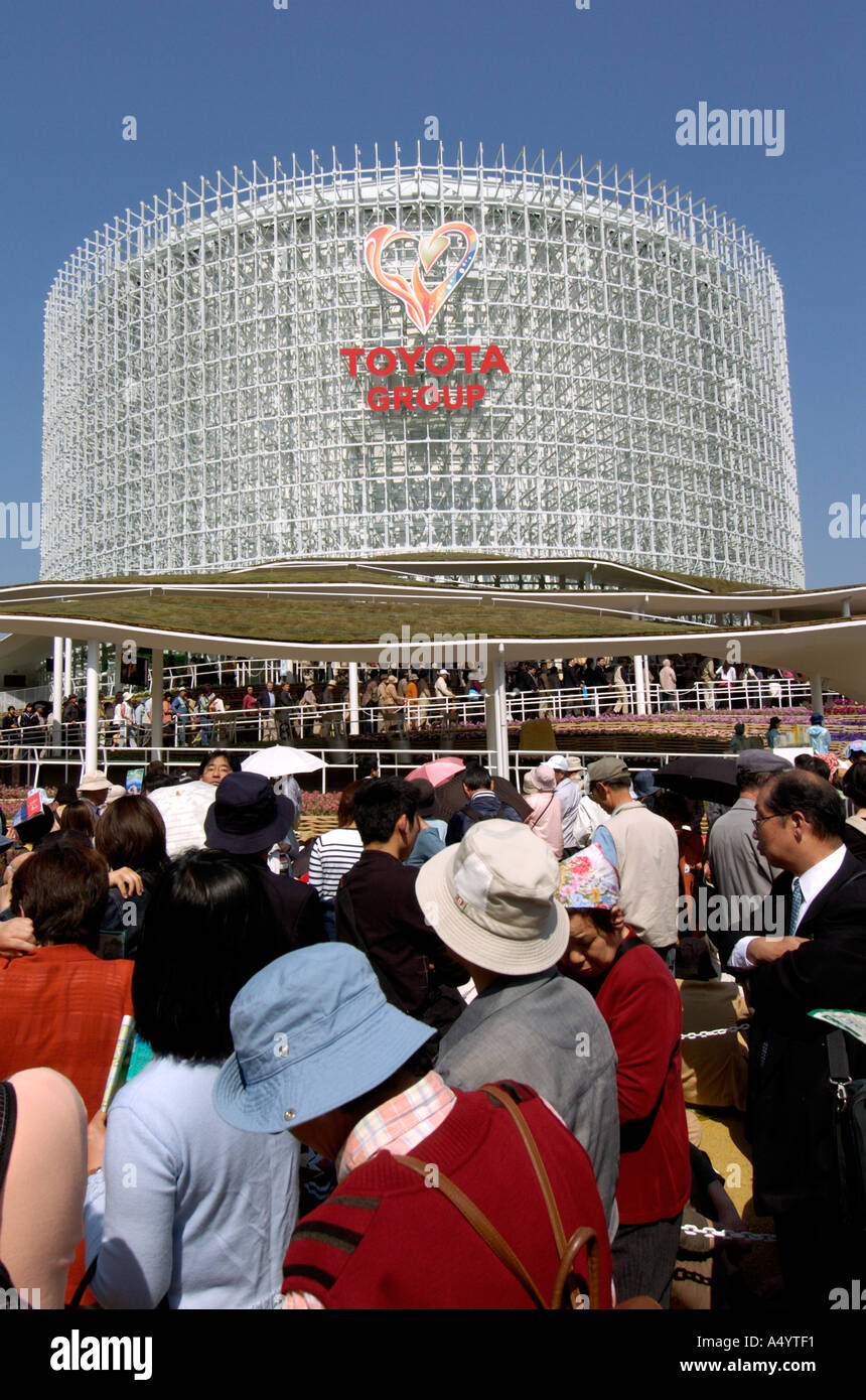 Crowds of visitors wait to enter the huge Toyota Pavilion at the World ...