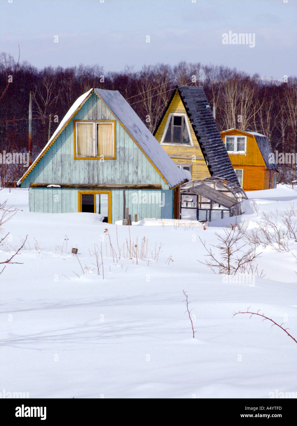 Dachas in the snow during winter on Sakhalin Island in Russian Far East ...