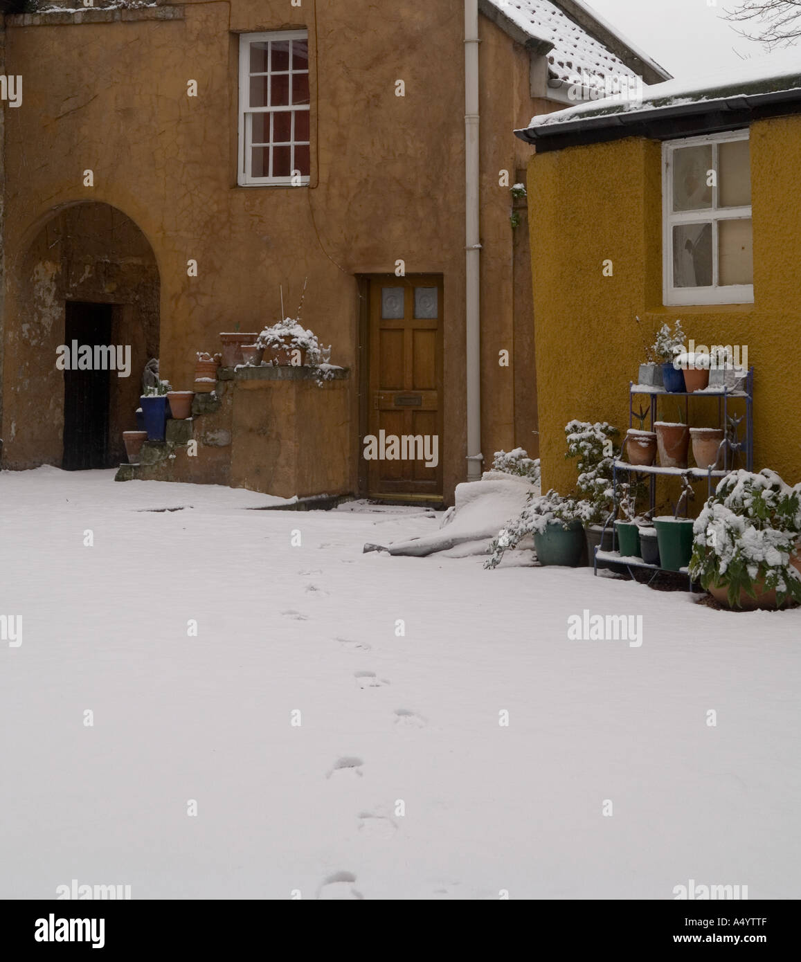 Snow in a courtyard Stock Photo - Alamy