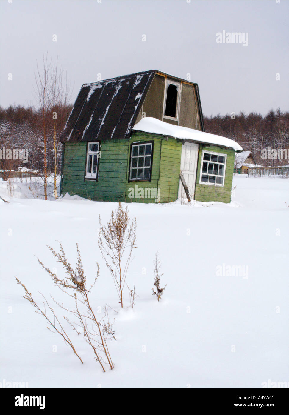 Dacha in the snow during winter on Sakhalin Island in Russian Far East ...