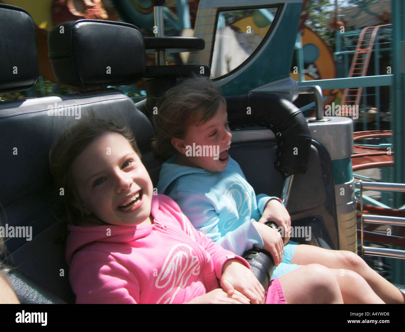 children having fun on a roller coaster Stock Photo - Alamy
