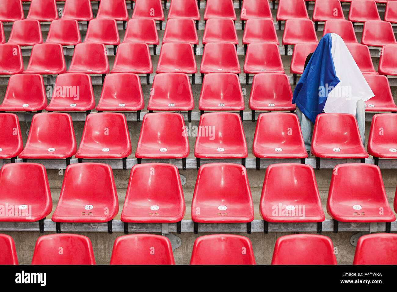 Fan alone and under flag Stock Photo - Alamy