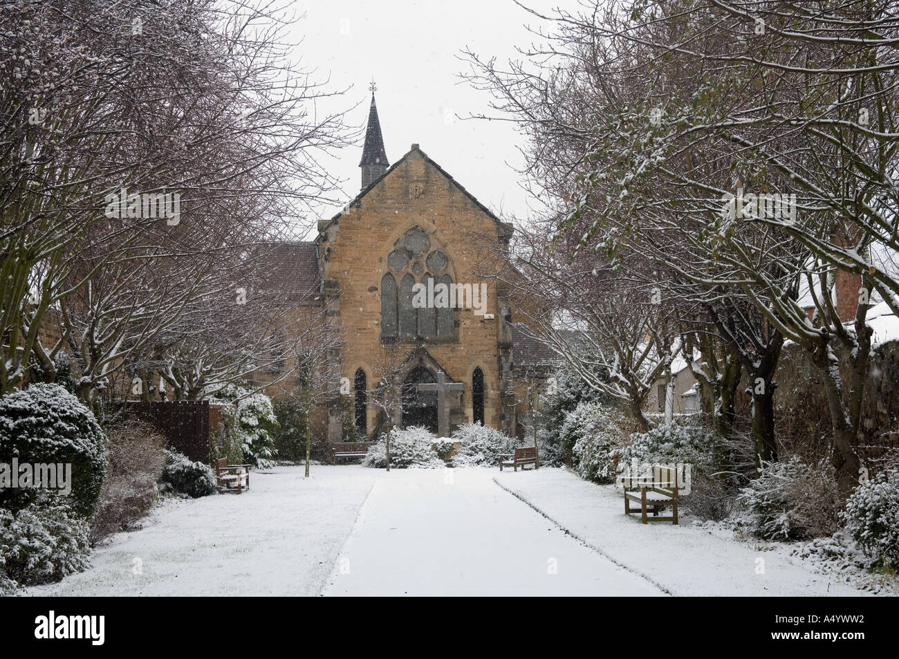 Small church and driveway covered in snow Stock Photo - Alamy