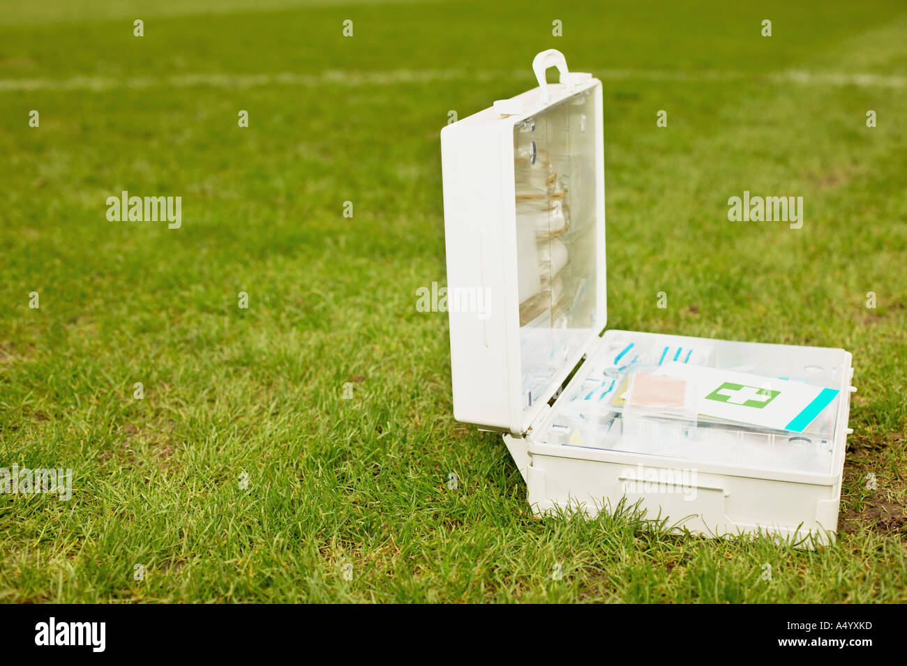 First aid kit on football pitch Stock Photo - Alamy