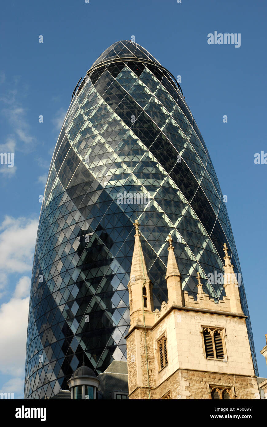 St Andrew Undershaft Church and the Gherkin at 30 St Marys Axe in the ...