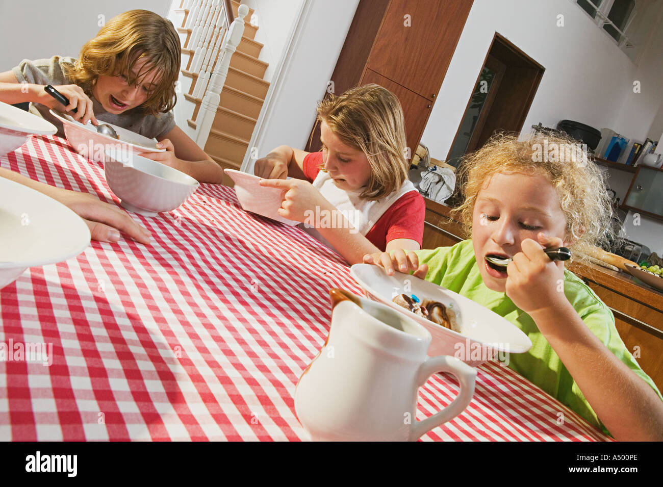 Children eating dessert Stock Photo - Alamy