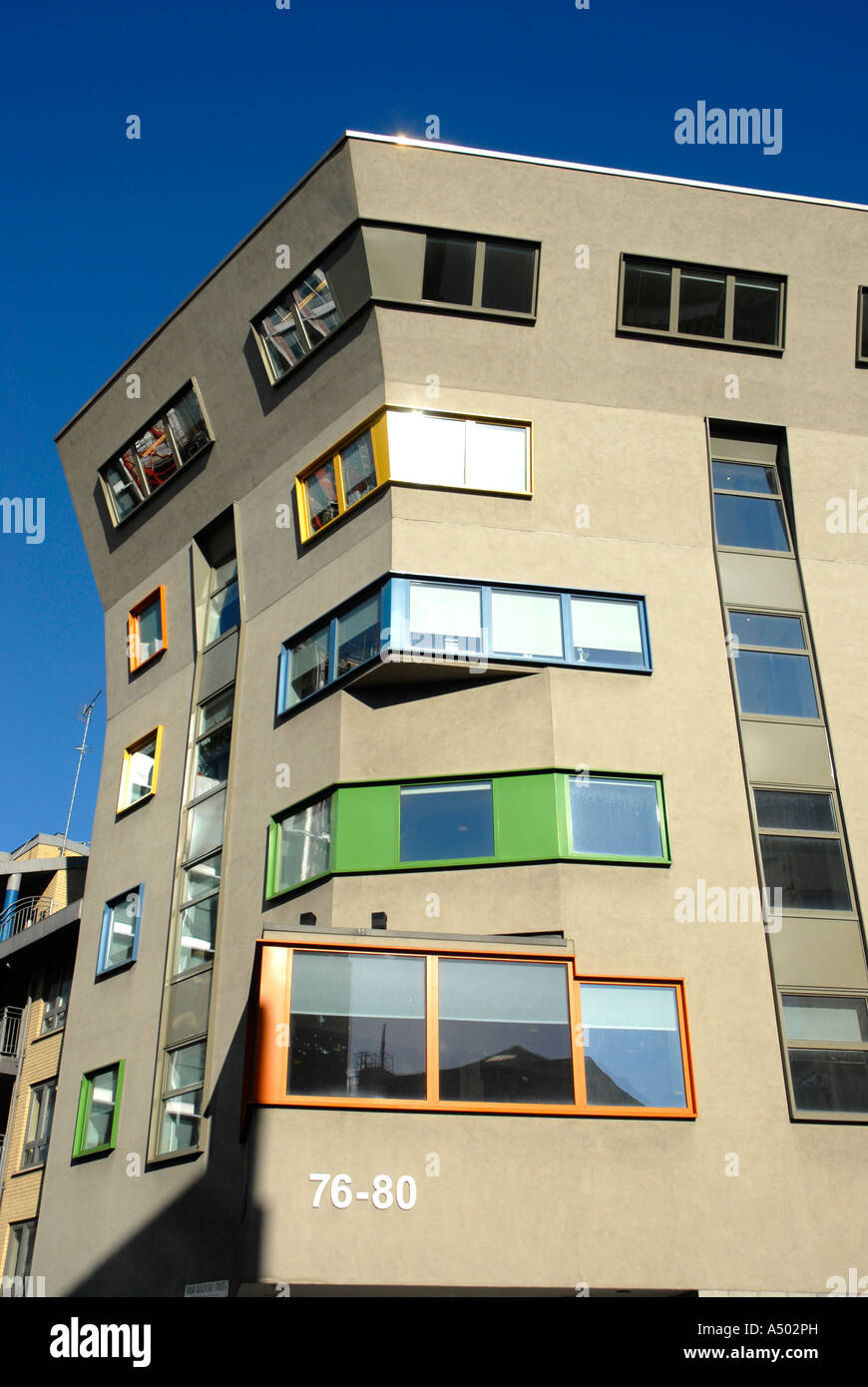 Angular building with coloured window frames at 76-80 Southwark Street ...