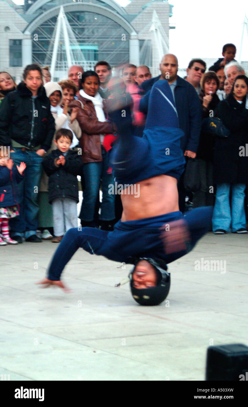 Breakdancer spinning on his head on the South Bank London Stock Photo ...