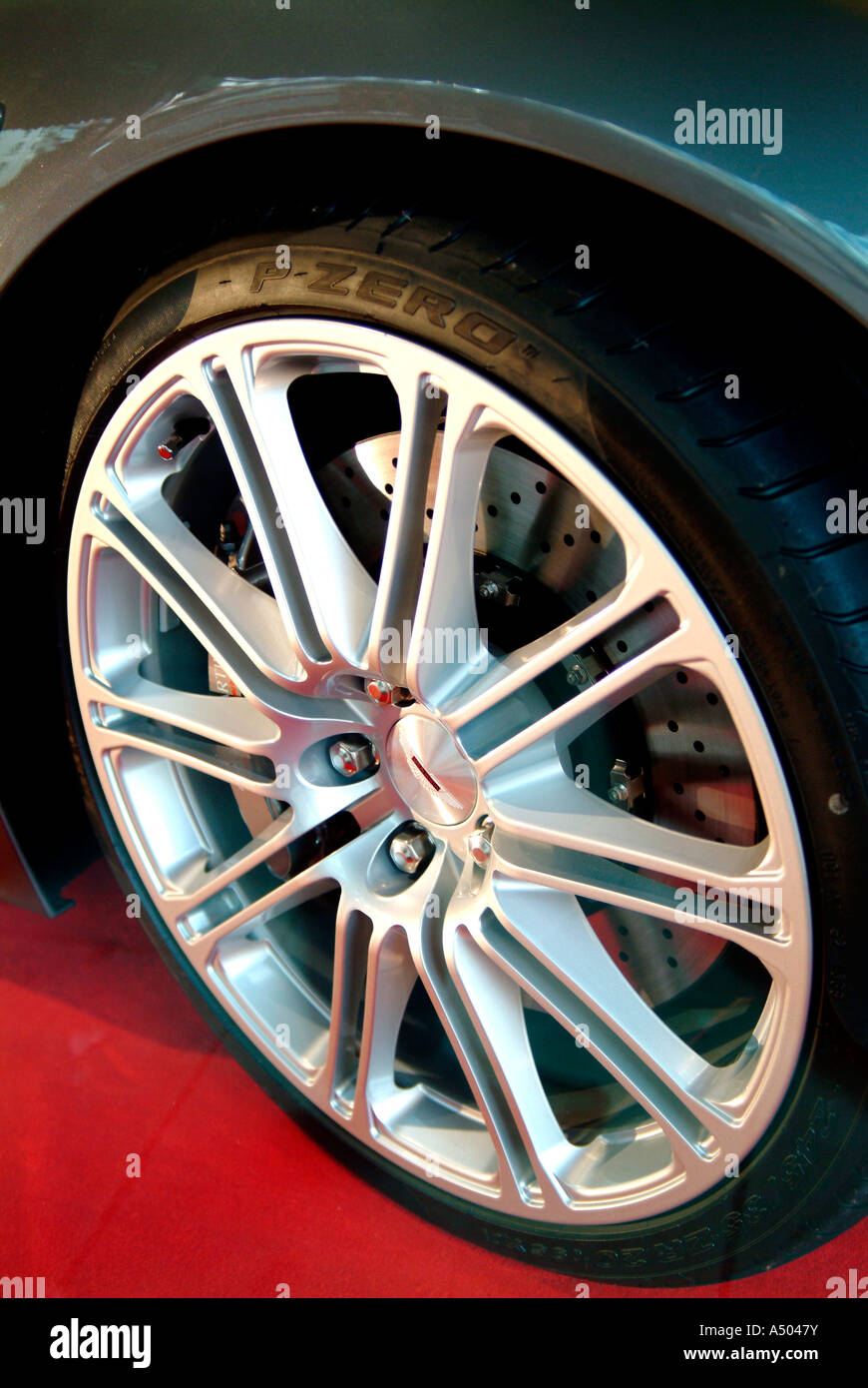 Custom car wheel in showroom London Stock Photo - Alamy