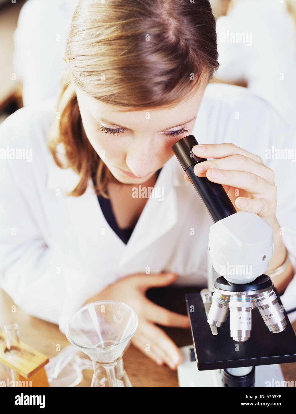 Student Girl Looking In A Microscope High Resolution Stock Photography ...