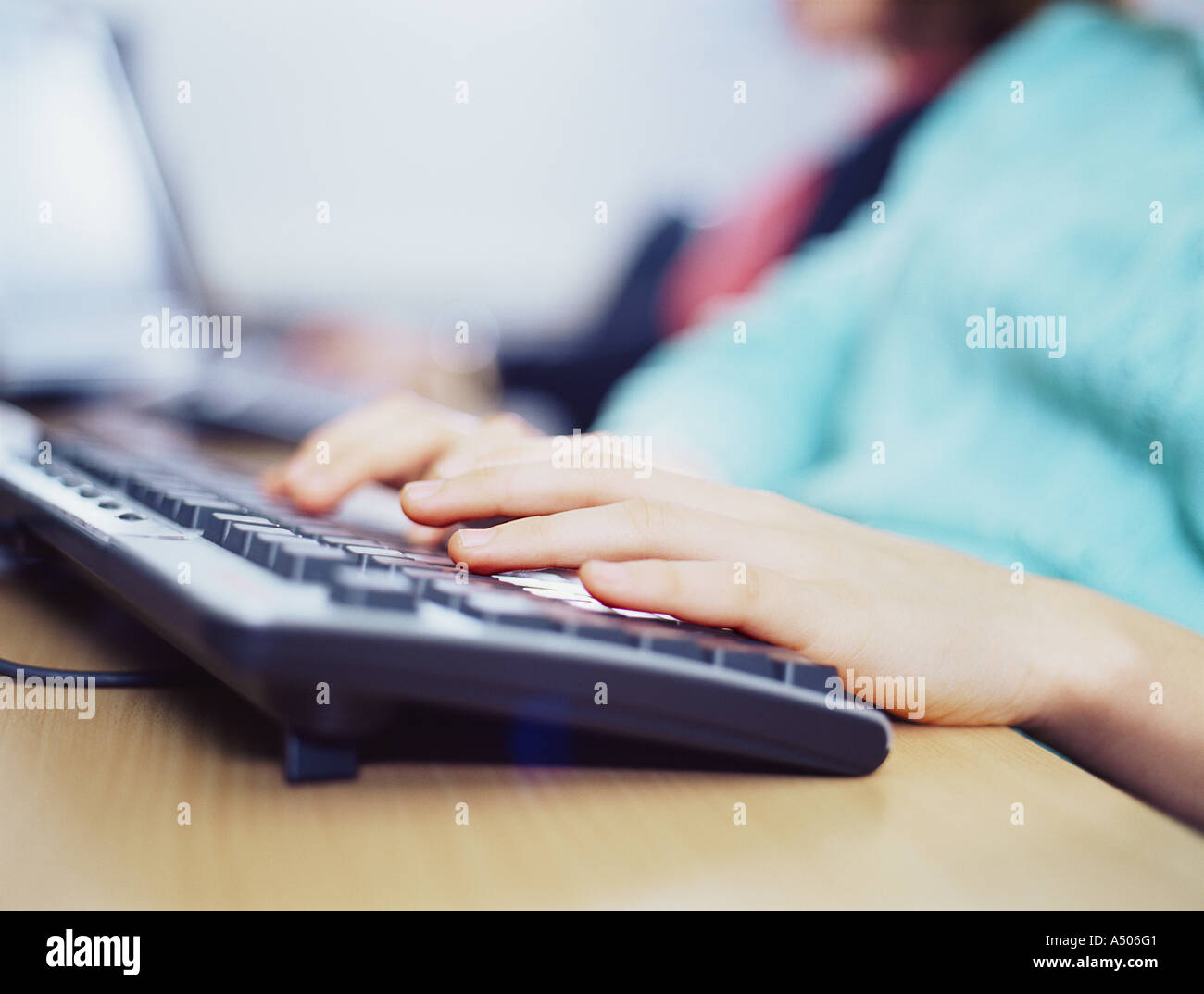 Girl using computer Stock Photo - Alamy