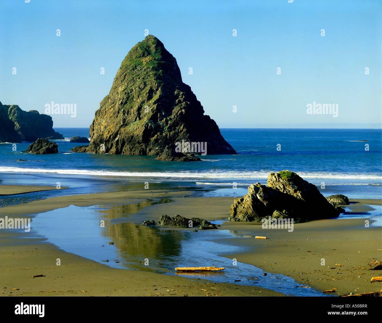 Huge rock monolith dominates Whale Head Cove on the Southern Oregon ...
