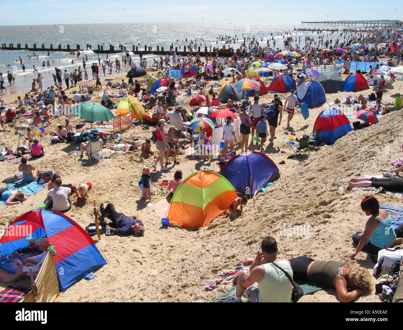 British seaside crowded beach scene, Lowestoft, Suffolk, England ...