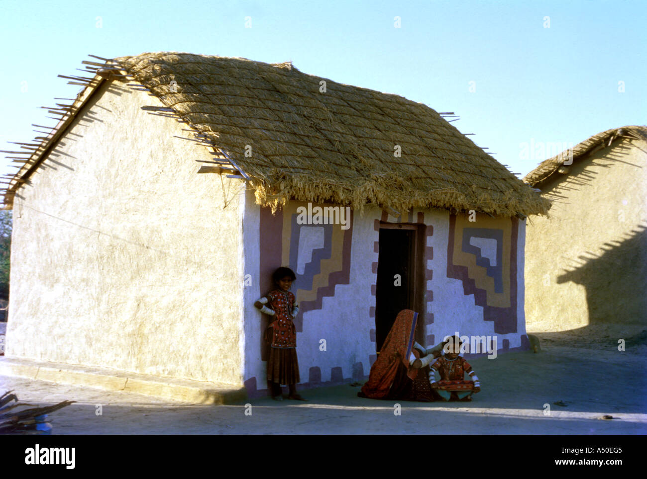 Children standing outside a hut in Gujar Stock Photo - Alamy