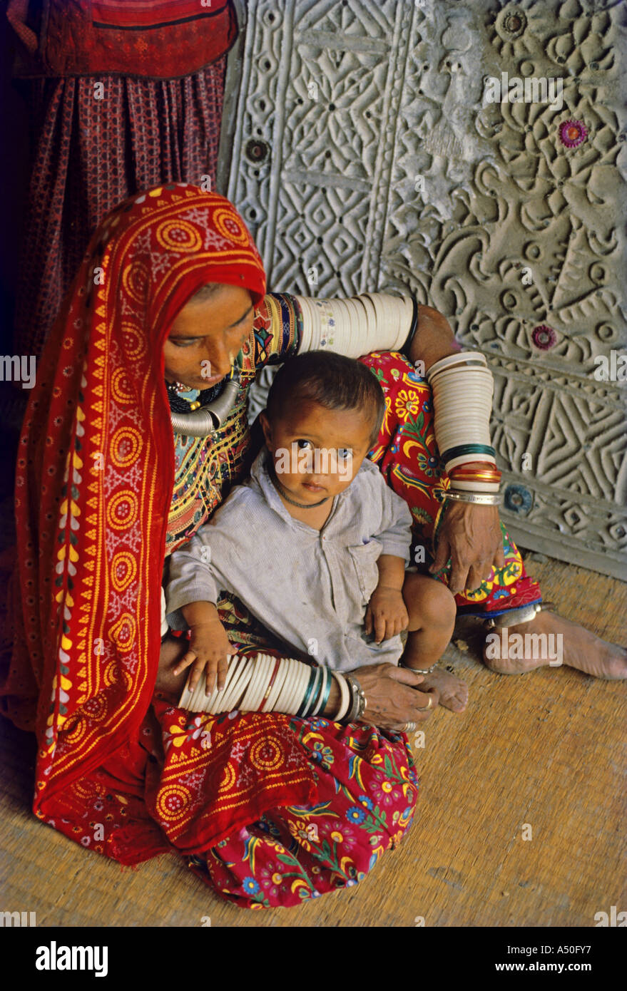 Woman sitting with her child at Banni in Stock Photo - Alamy