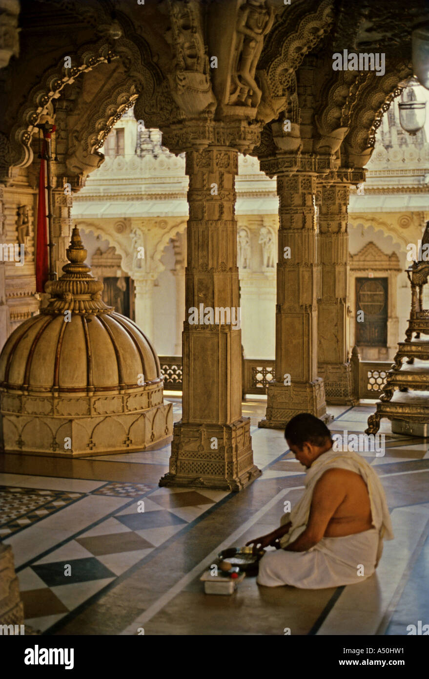 Man praying at Hathee Singh temple at Ah Stock Photo - Alamy