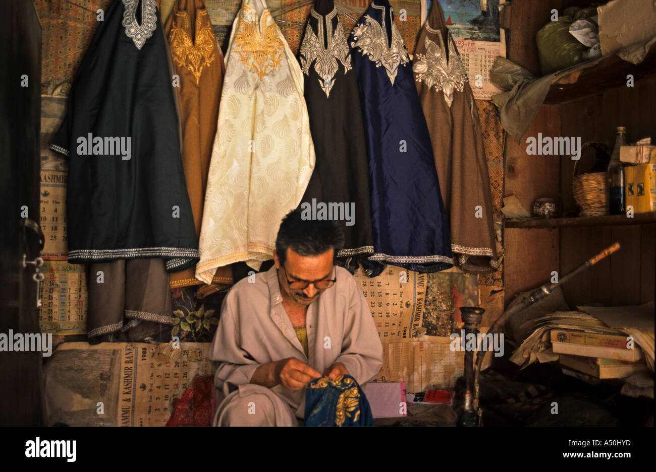 Man embroidering hi-res stock photography and images - Alamy