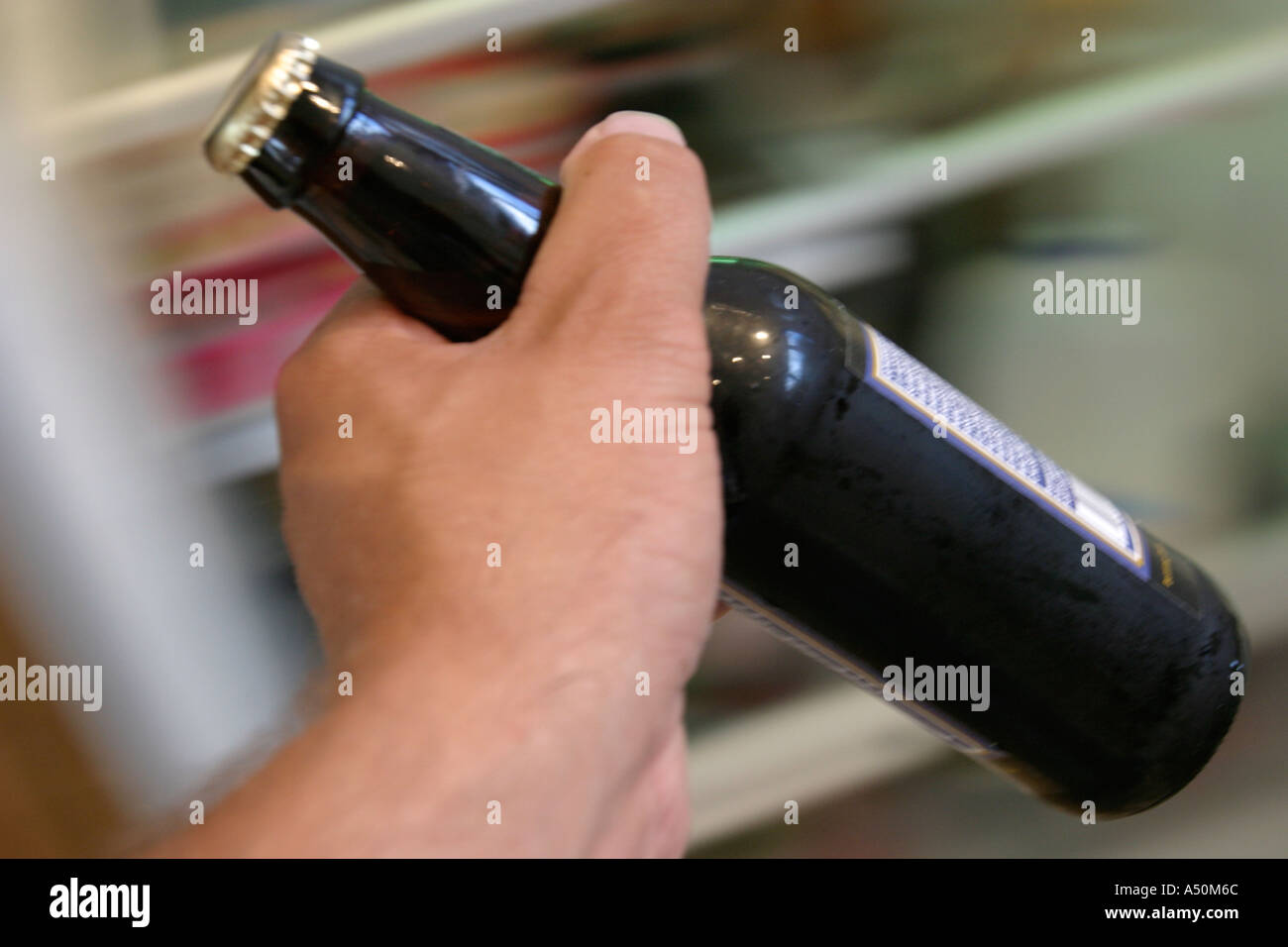 Hand and Beer Stock Photo - Alamy
