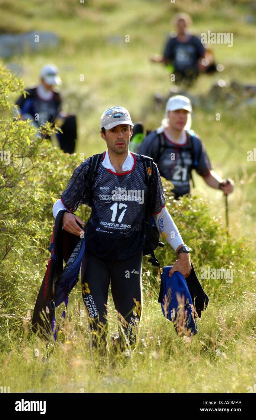 Adventure race athletes on trek section Stock Photo - Alamy