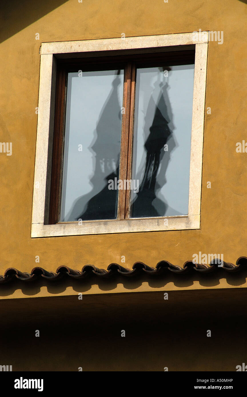 Reflection of church spire in window, Prague Czech Republic Stock Photo ...