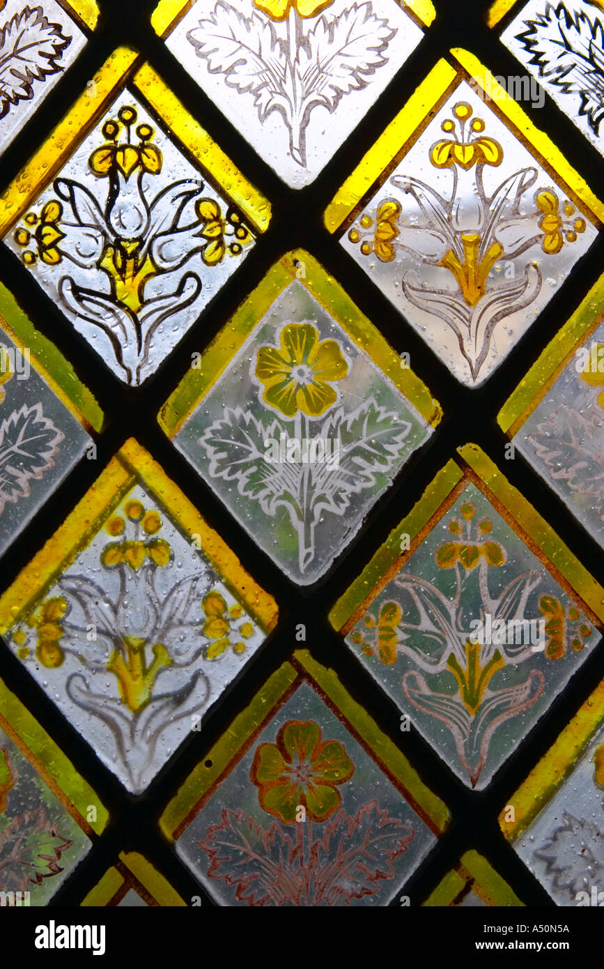 Stained glass window at cloister of Gloucester Cathedral ...