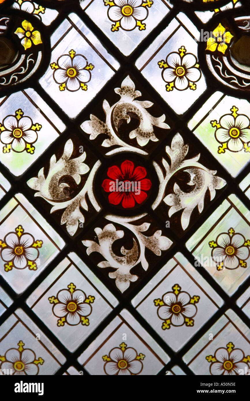 Stained glass window at cloister of Gloucester Cathedral ...