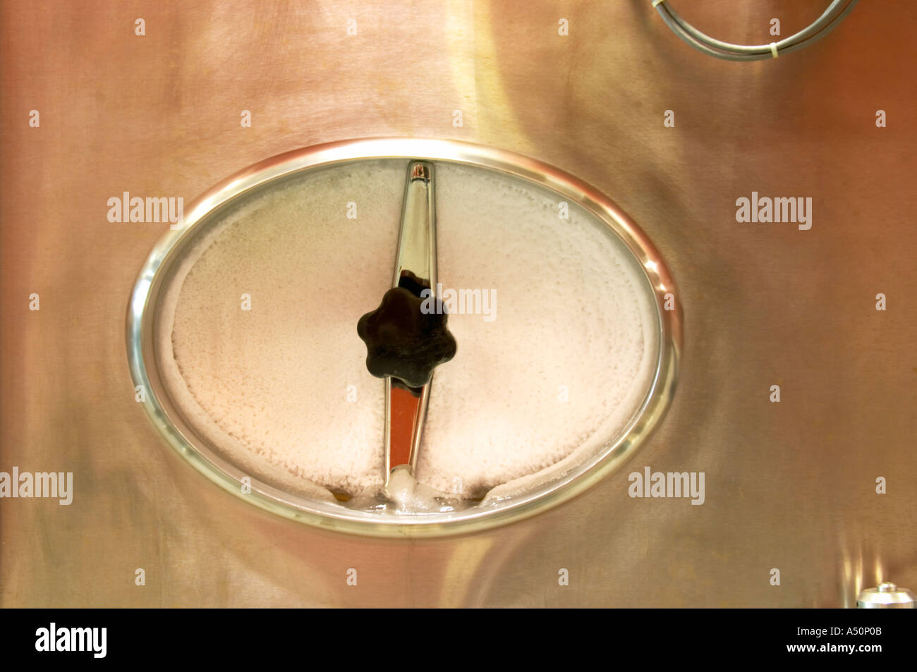 The frosty icy door of a cold stabilisation stabilization tank at ...