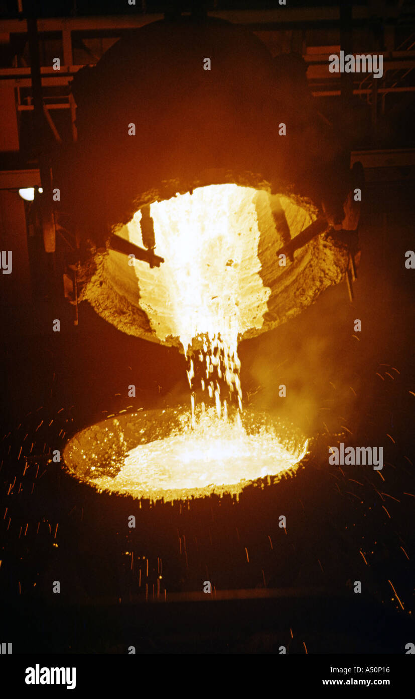 Molten slag being poured out of a steel making ladle after teeming the ...