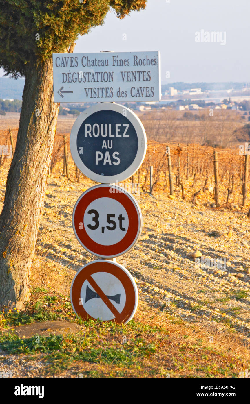 Signs indicating the wine cellar shop tasting room and traffic warning ...