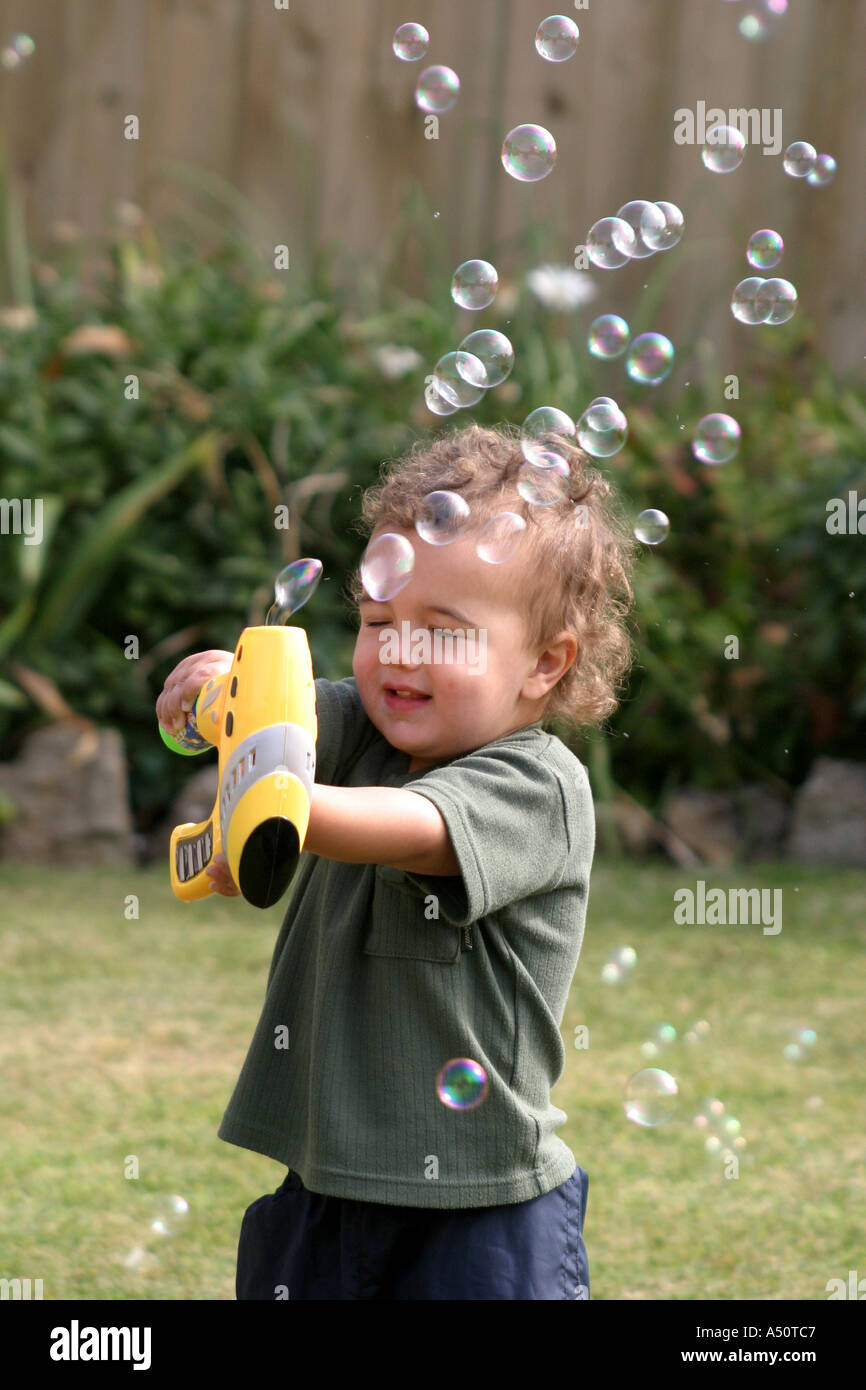 Bubble gun children hi-res stock photography and images - Alamy