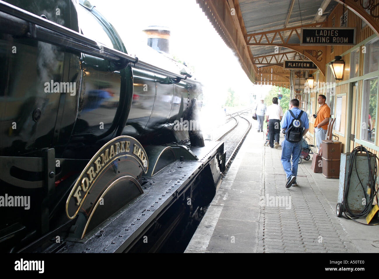 Steam train waiting at the platform Stock Photo - Alamy