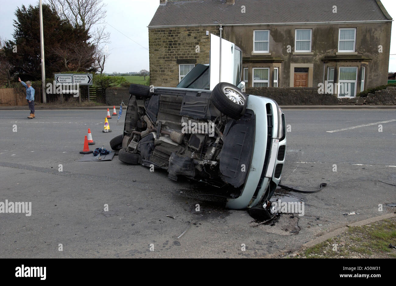 BMW car on its side after being involved in a road traffic accident ...