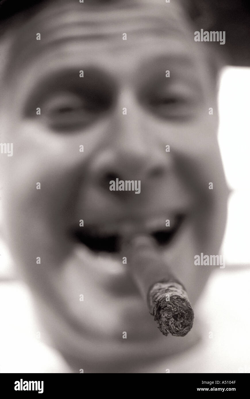 Cigar in mouth hi-res stock photography and images - Alamy