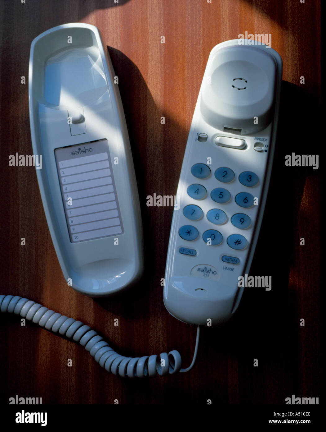 Old push button handset type plastic telephone Stock Photo - Alamy