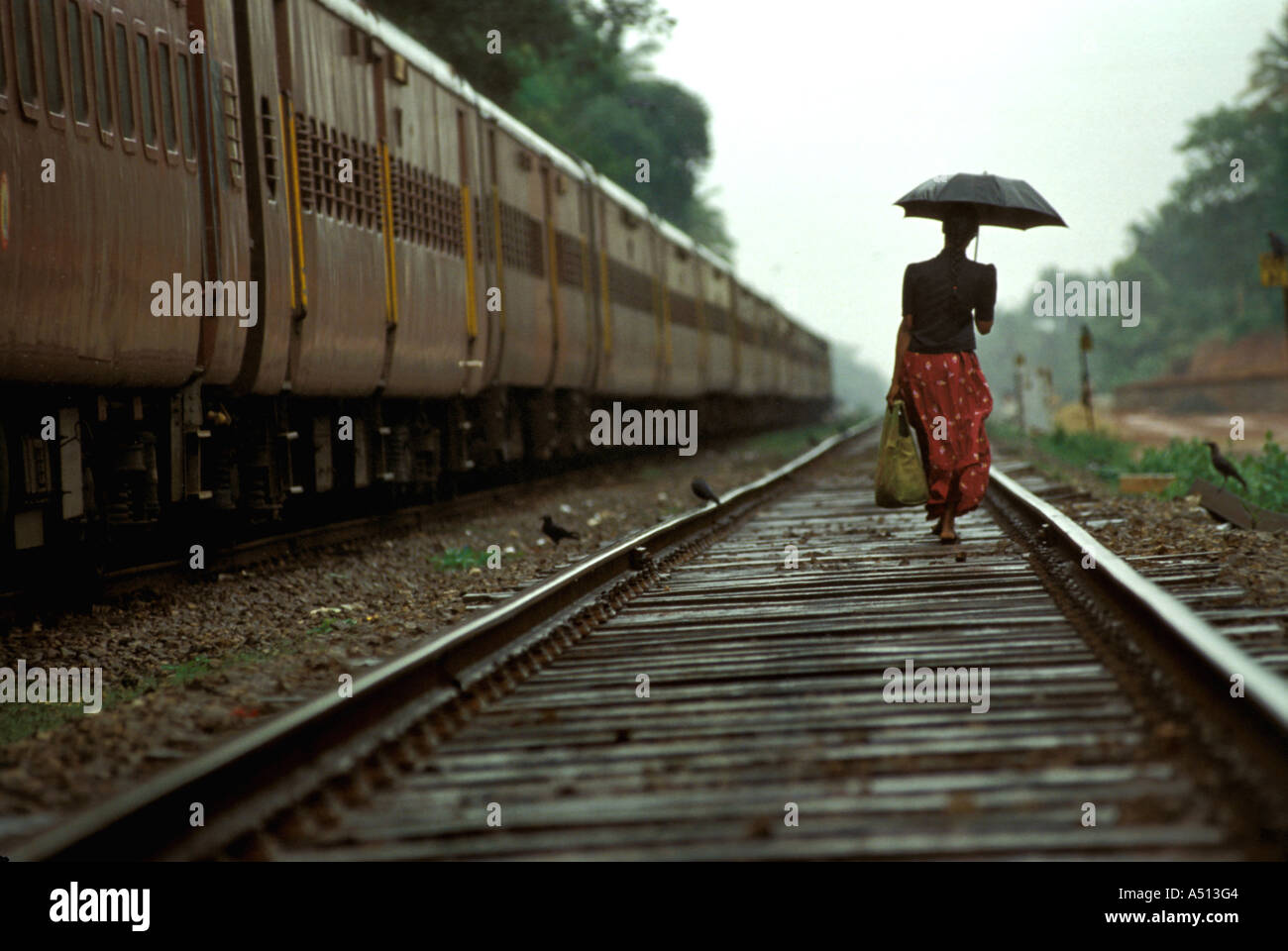 Indian woman on railway track hi-res stock photography and images - Alamy